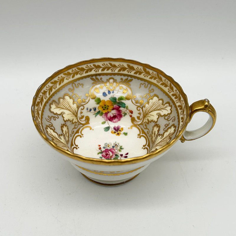Cauldon China Trio, Decorated with hand Painted Flowers and Gold Leaves